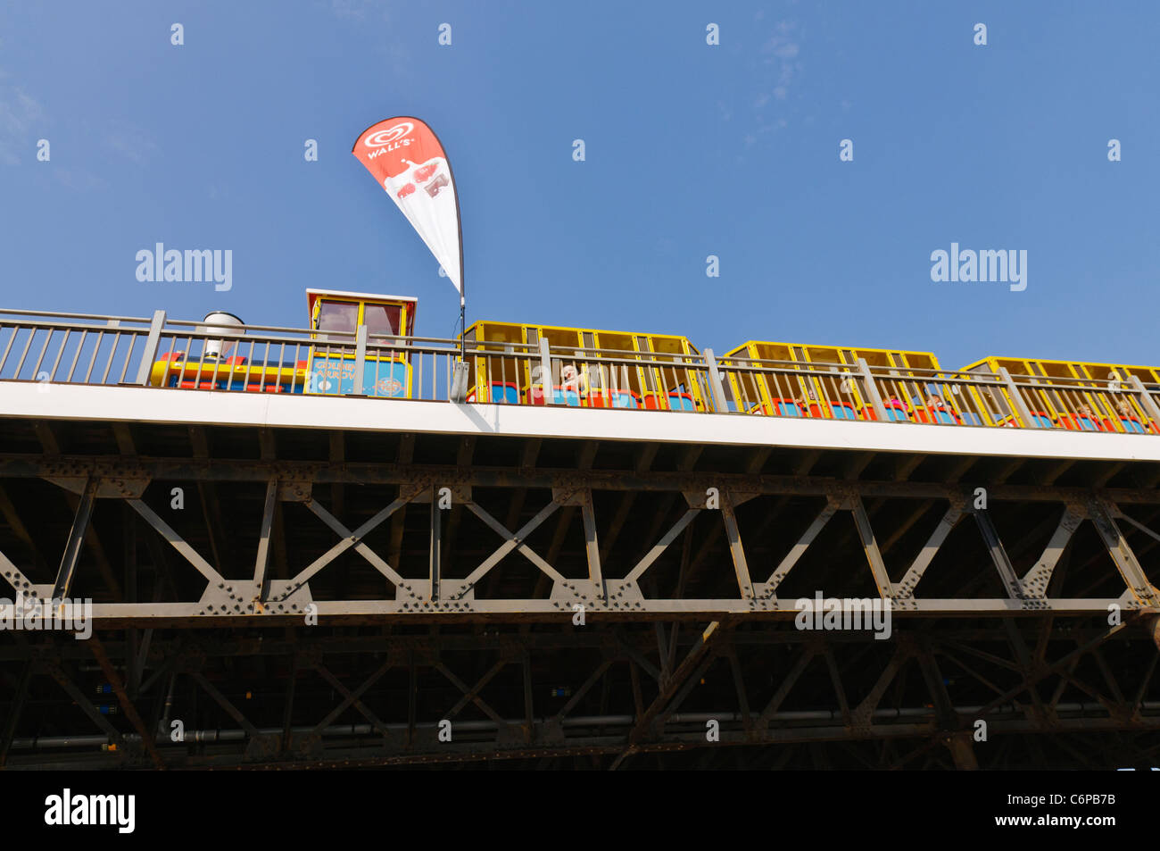Tourists walk on boardwalk people stroll crowds hi-res stock ...