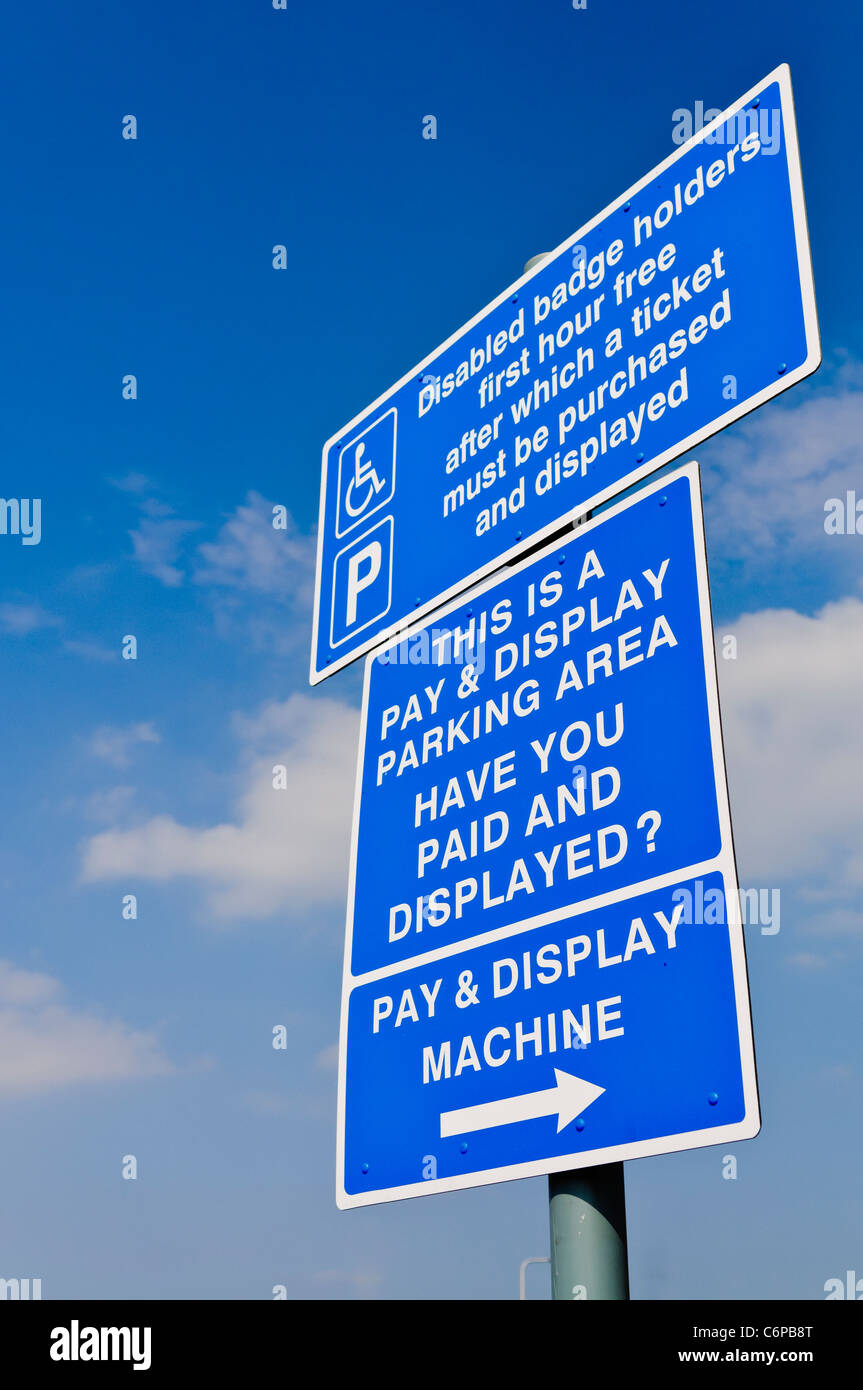 Car park sign warning disabled drivers that payment is required Stock ...