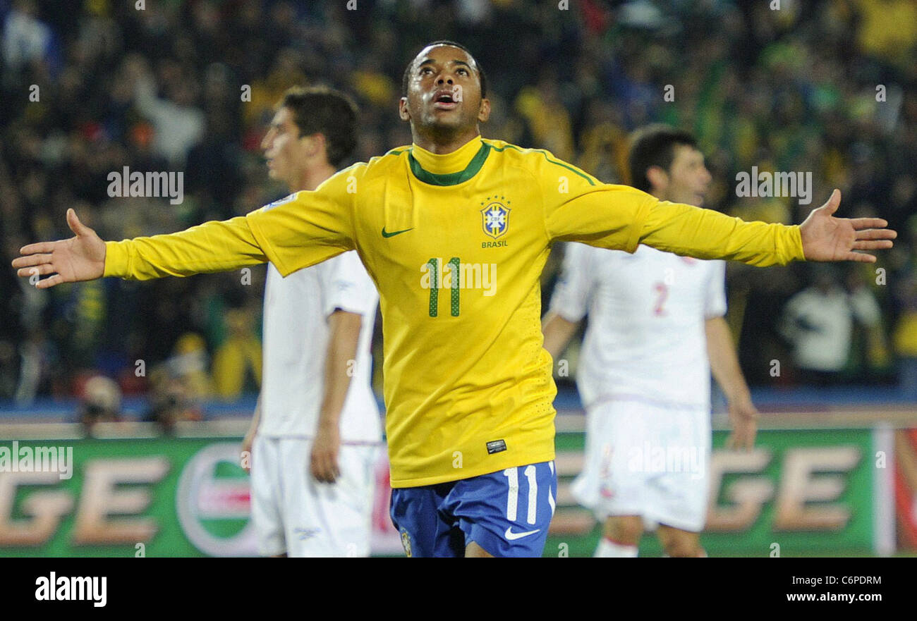 Brazil striker Robinho celebrates after scoring his side's third goal ...