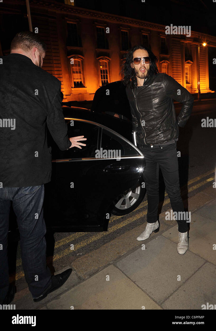 Russell Brand's leg was hit by the closing door of his car as he made ...