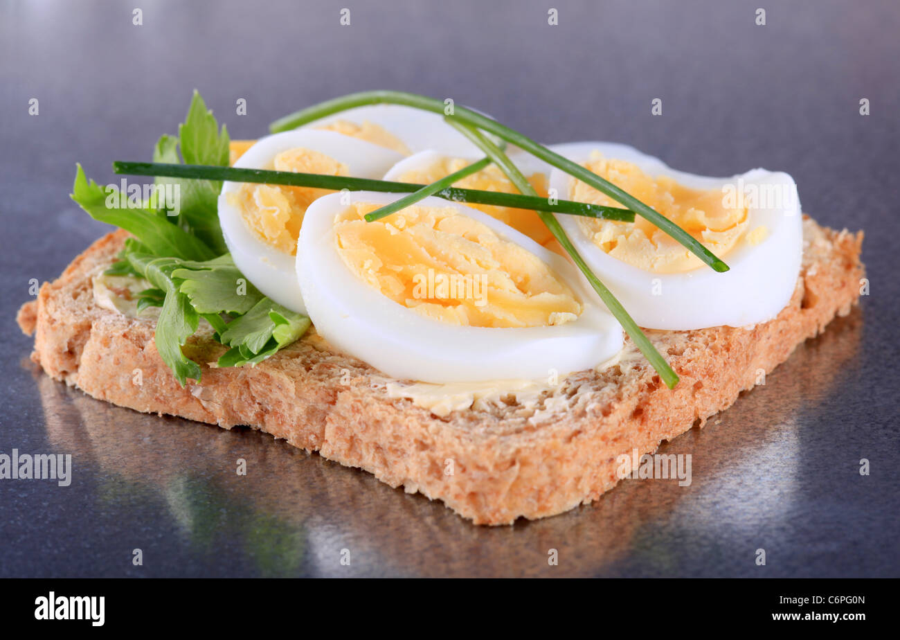 Slice of whole wheat bread with boiled egg Stock Photo - Alamy