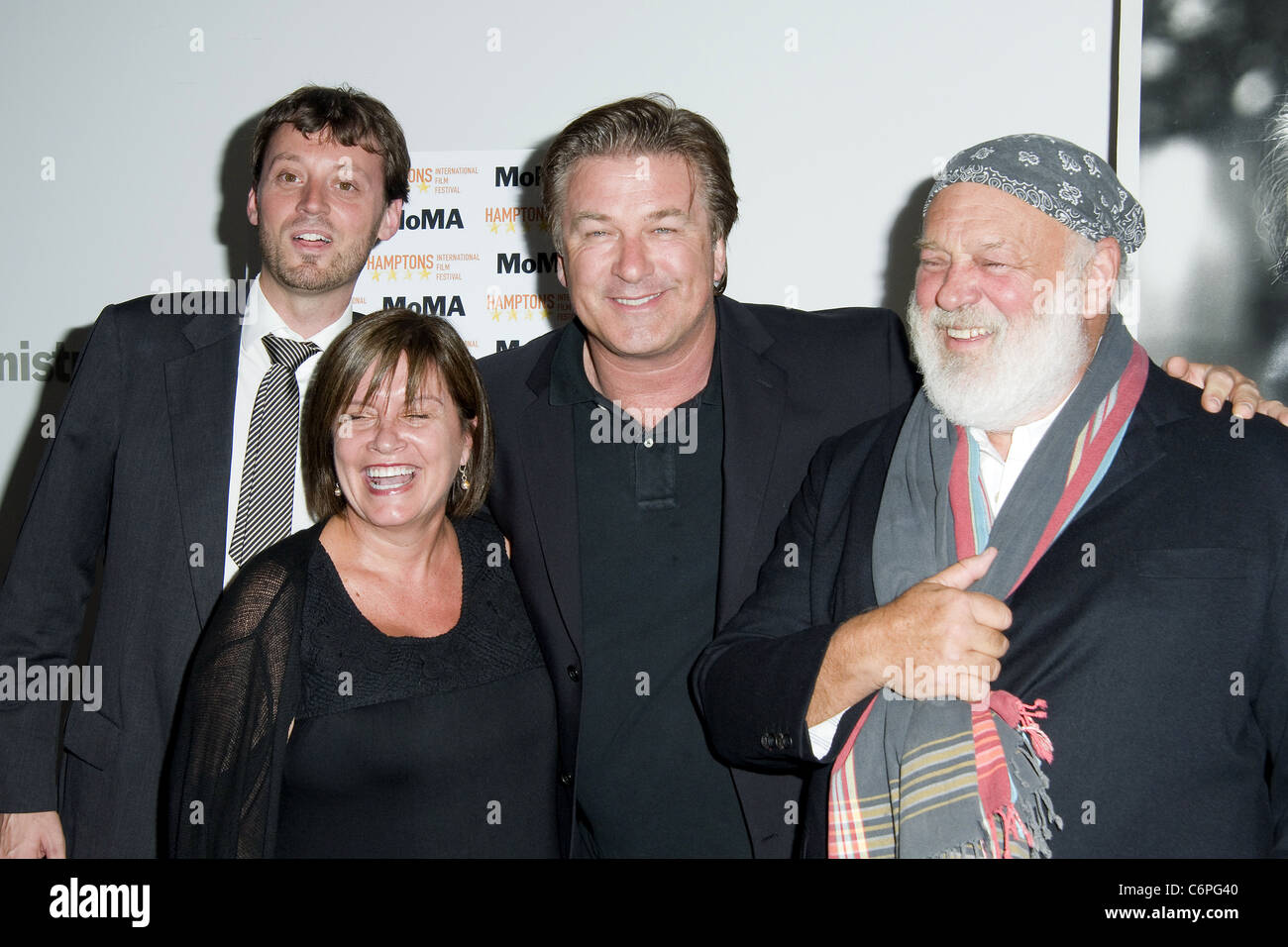 Alec Baldwin and Bruce Weber with guests The 17th Annual Hamptons ...