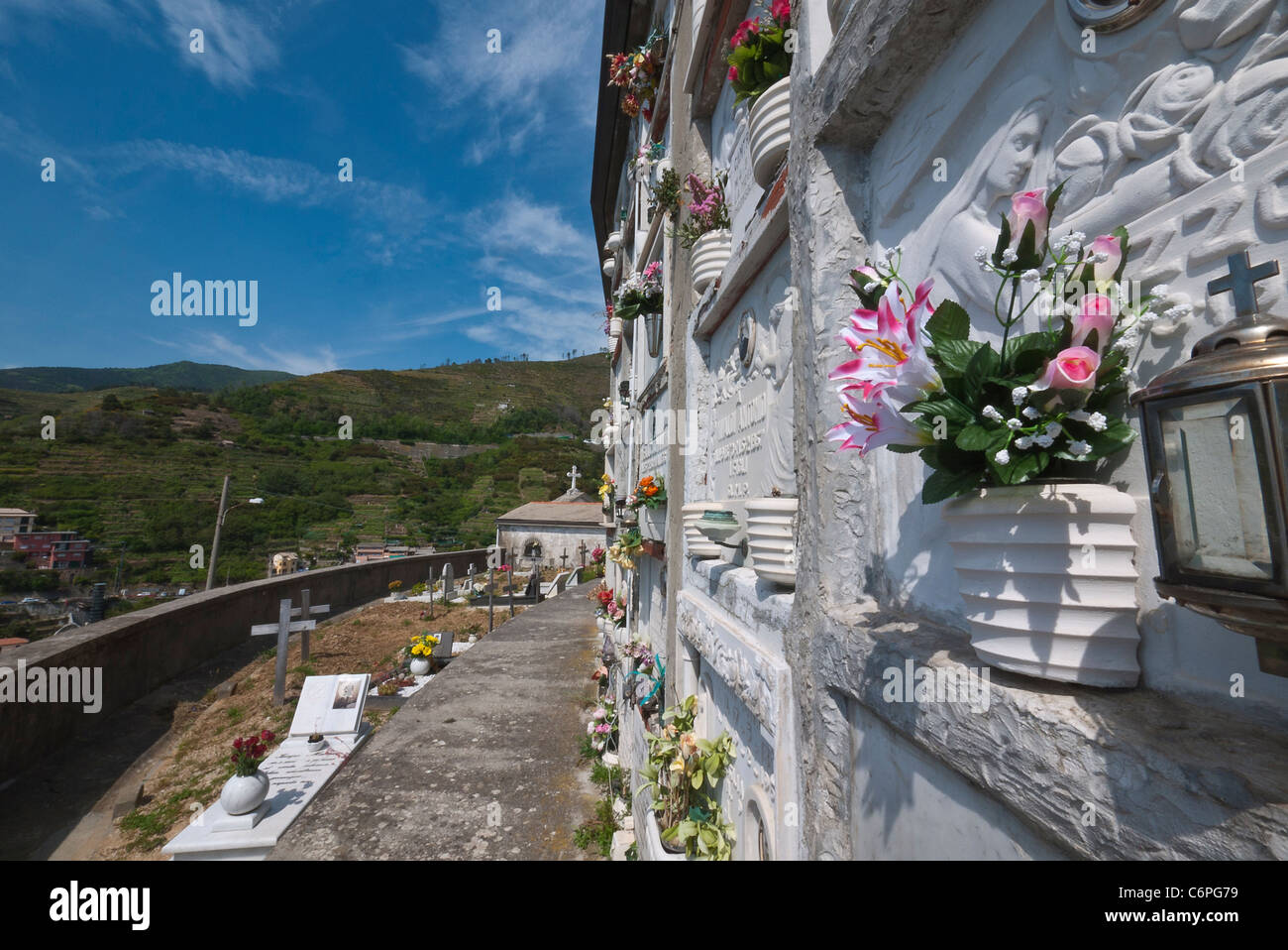 The columbarium walls of the town cemetery in Riomaggiore, Cinque Terre ...