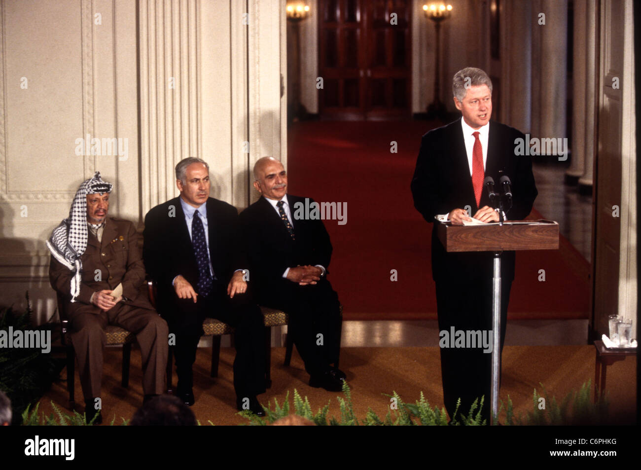 President Bill Clinton makes a statement as PLO leader Yasser Arafat ...