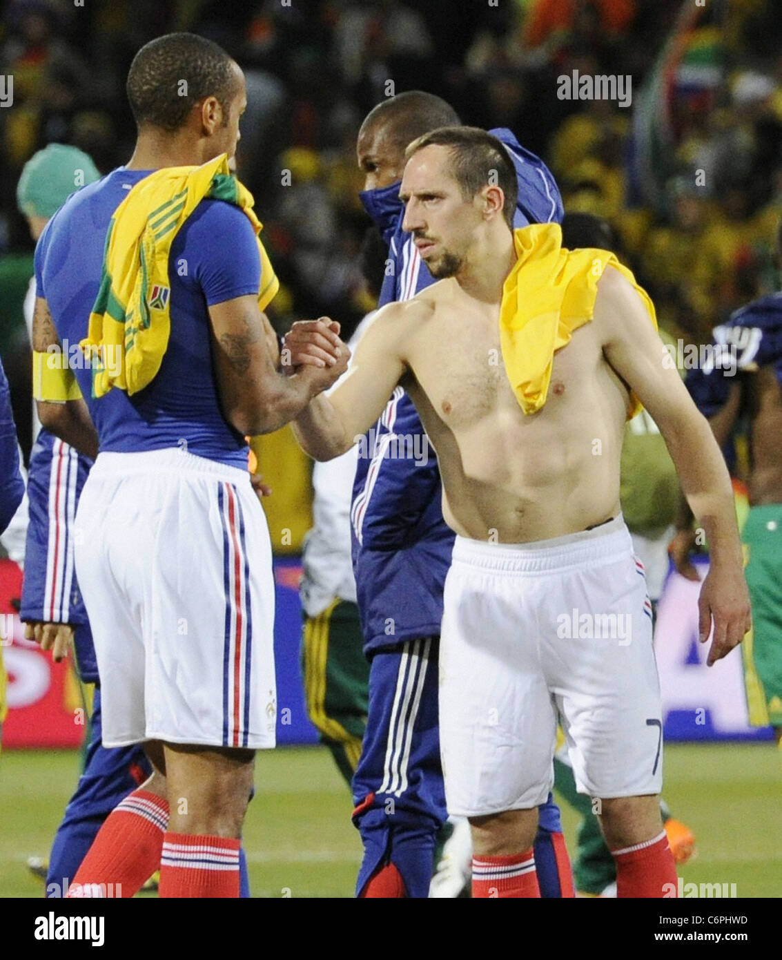 France's Franck Ribery (R) shakes hands with teammate Thierry Henry ...