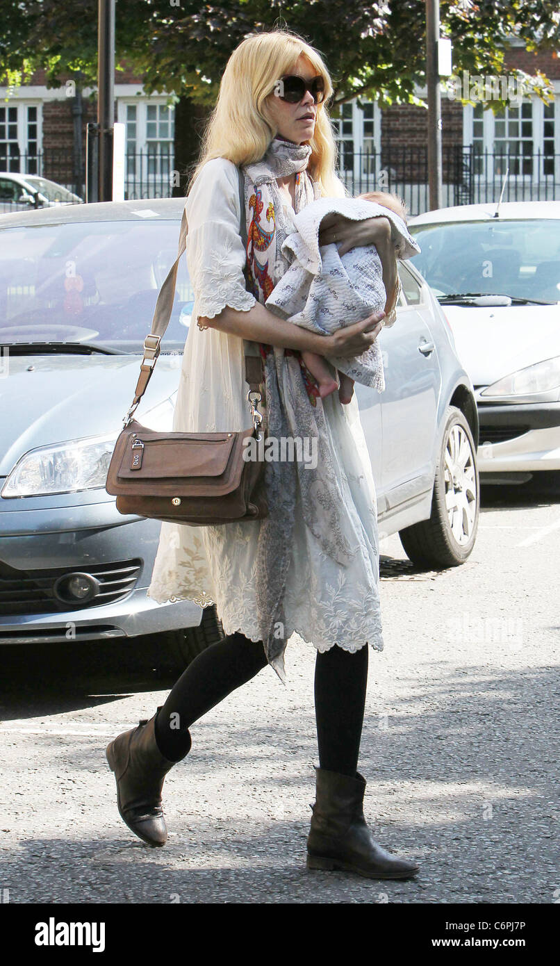 Claudia Schiffer out and about carrying her baby daughter Cosima Violet ...