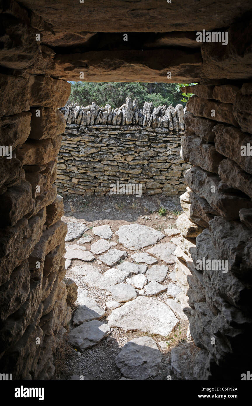 Ancient hut made from stones in The Bories Village, near Gordes in ...