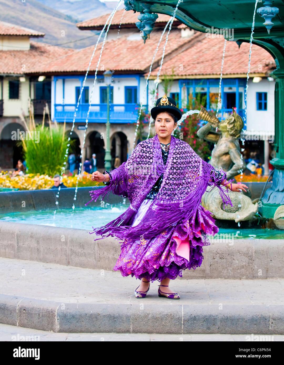 Peruvian dancer with traditional clothes dancing in street in Cusco ...