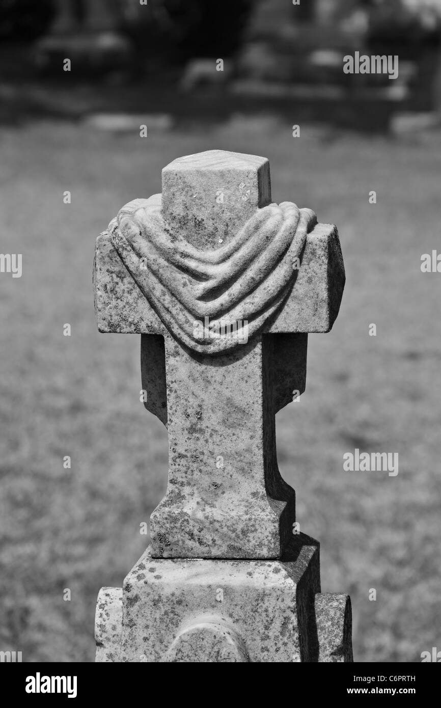 A stone cross memorial at a old cemetery Stock Photo - Alamy