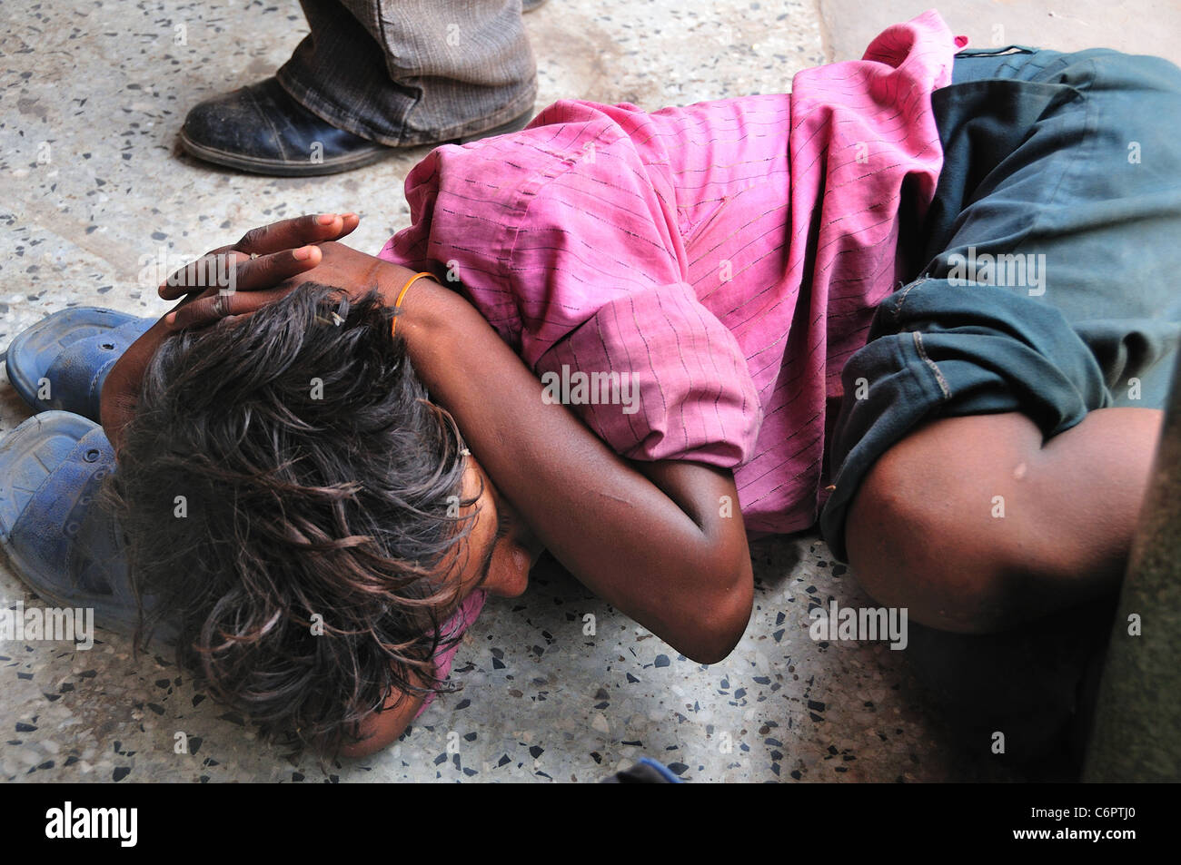 Street boy sleeping Stock Photo - Alamy