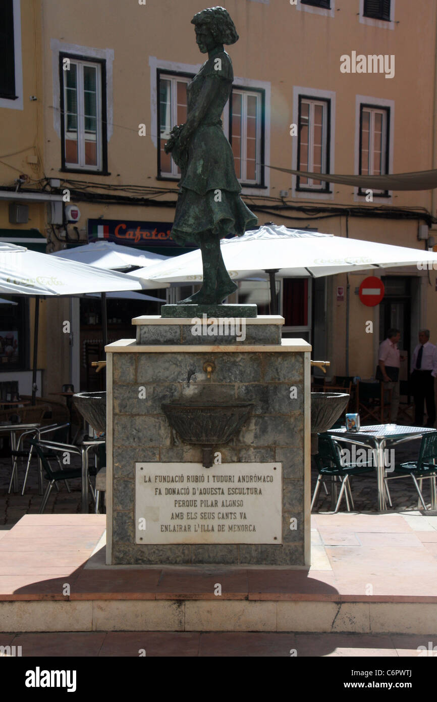 A young girl statue in the middle of a town in Menorca Stock Photo - Alamy