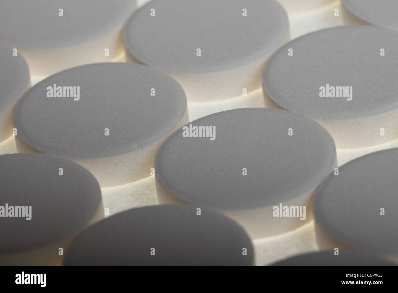 white big pills background texture Stock Photo - Alamy