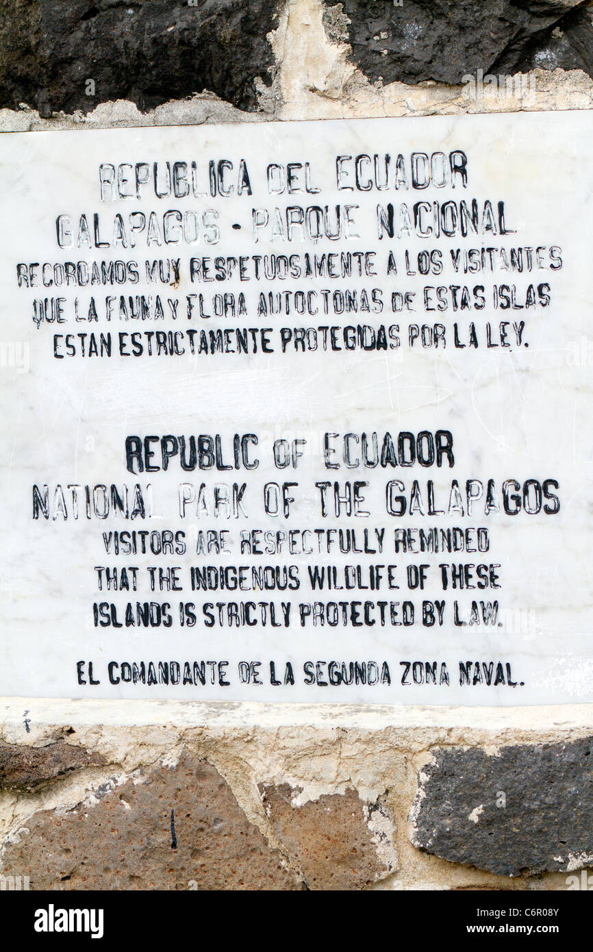 Dual language sign in the Galapagos National Park reminding visitors ...