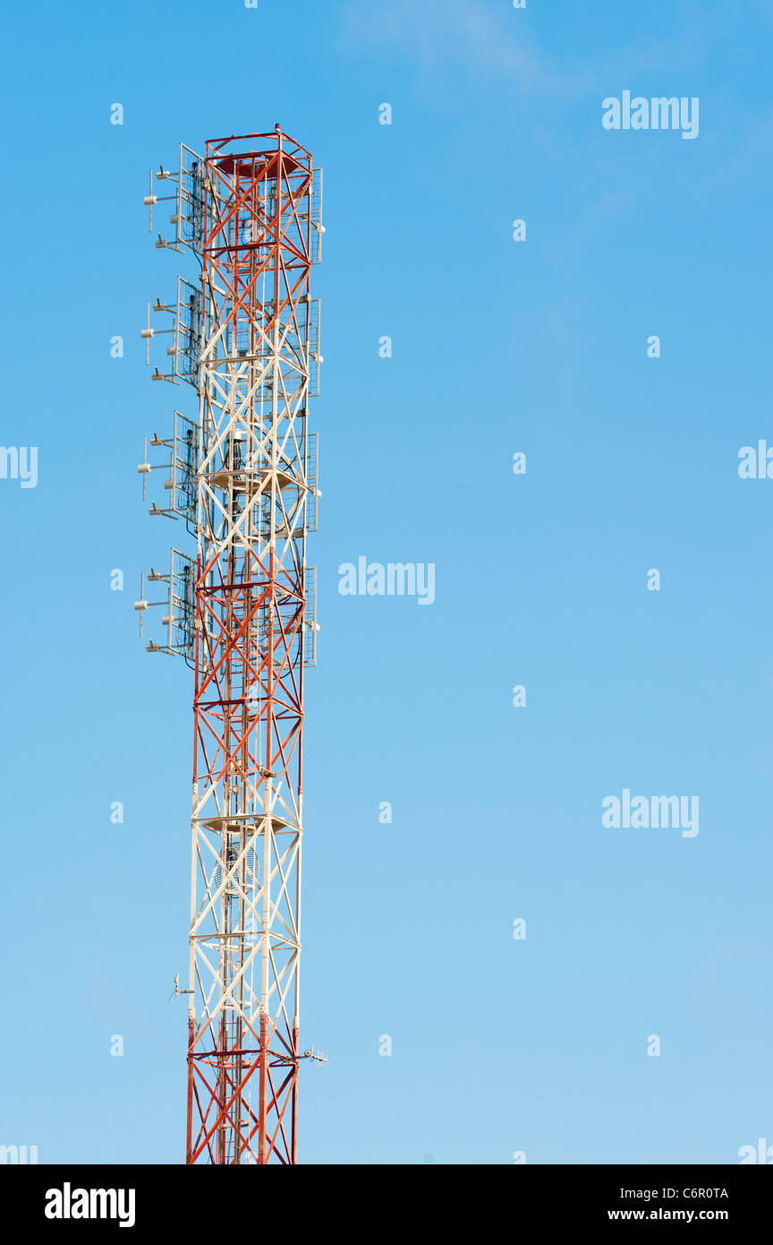Telecom mast with multiple uses against blue sky background Stock Photo ...