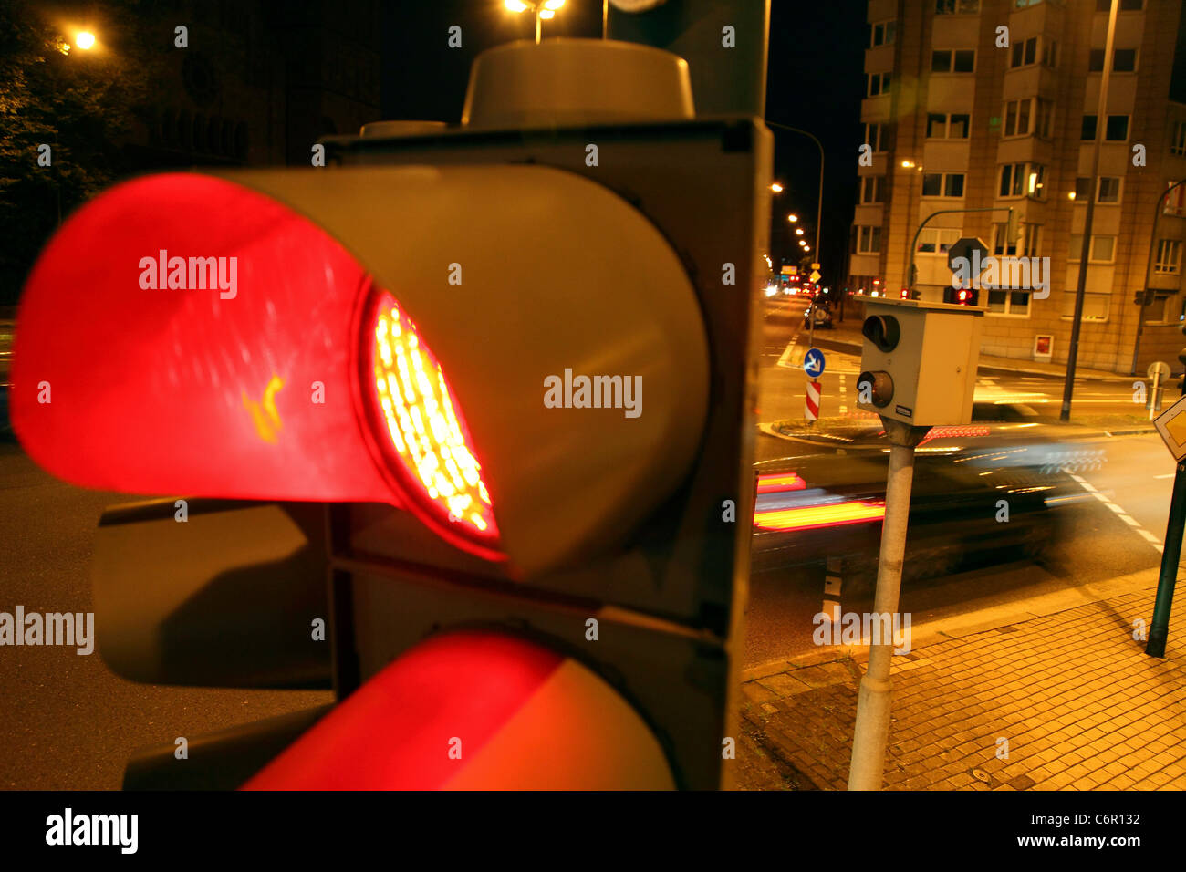 Traffic camera, at a traffic light, inner city street crossing ...