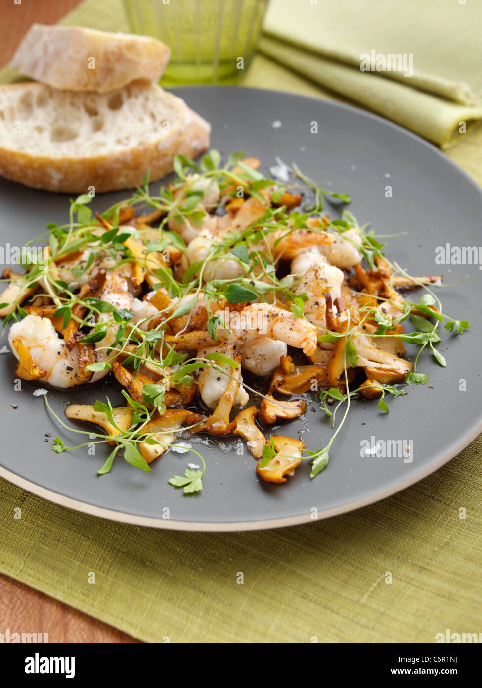 Prawns and girolle mushrooms Stock Photo - Alamy
