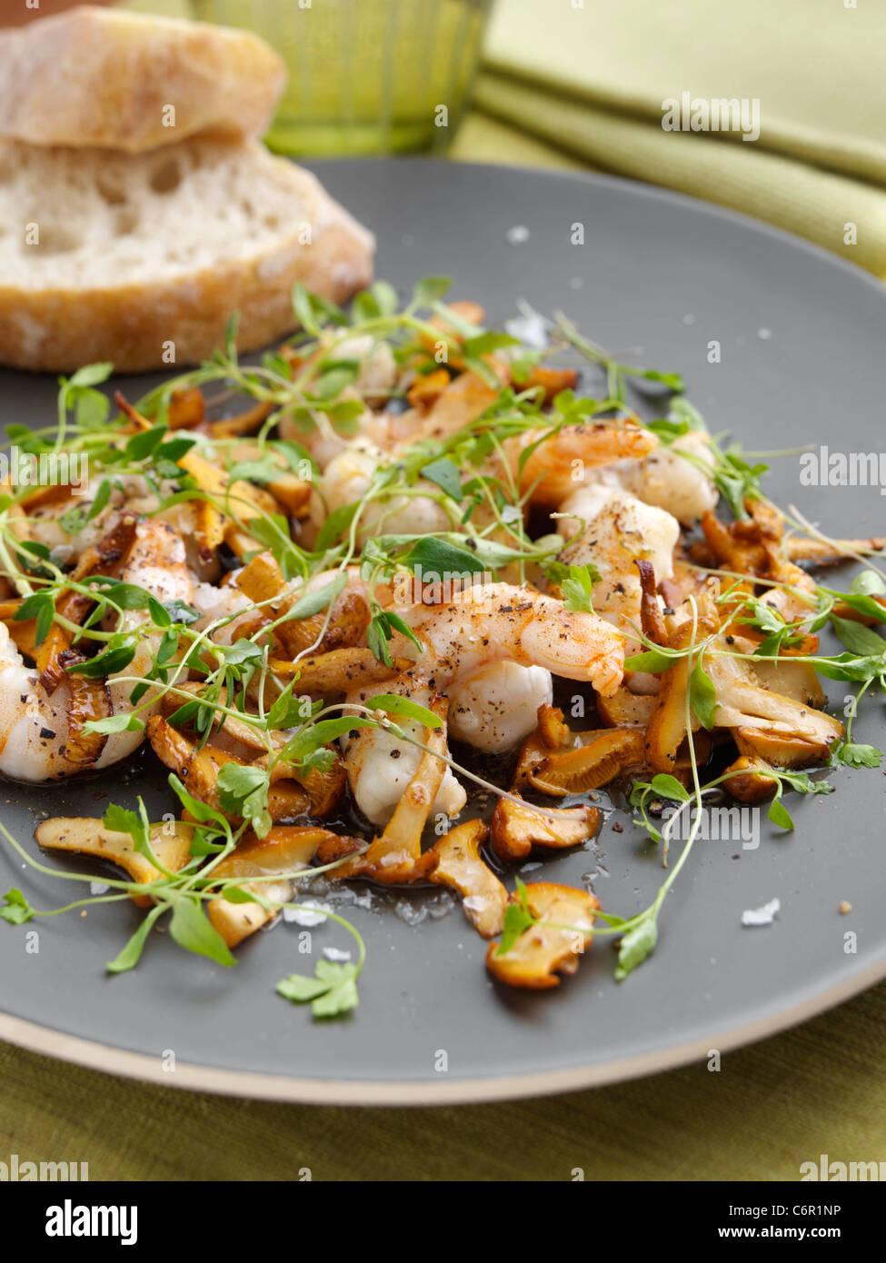 Prawns and girolle mushrooms Stock Photo - Alamy