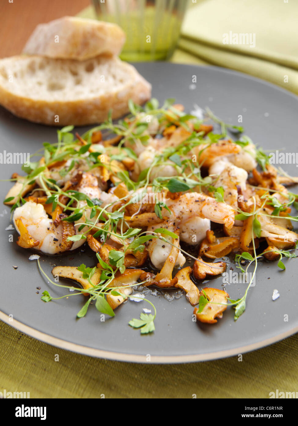 Prawns and girolle mushrooms Stock Photo - Alamy