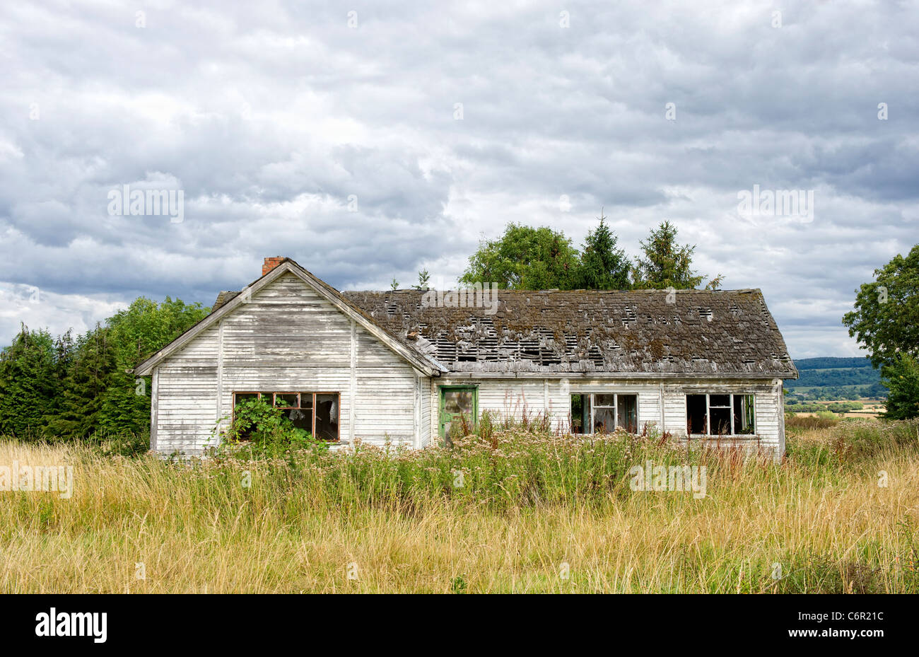 Old dilapidated building on scrub land near Winchcombe in The Cotswolds ...