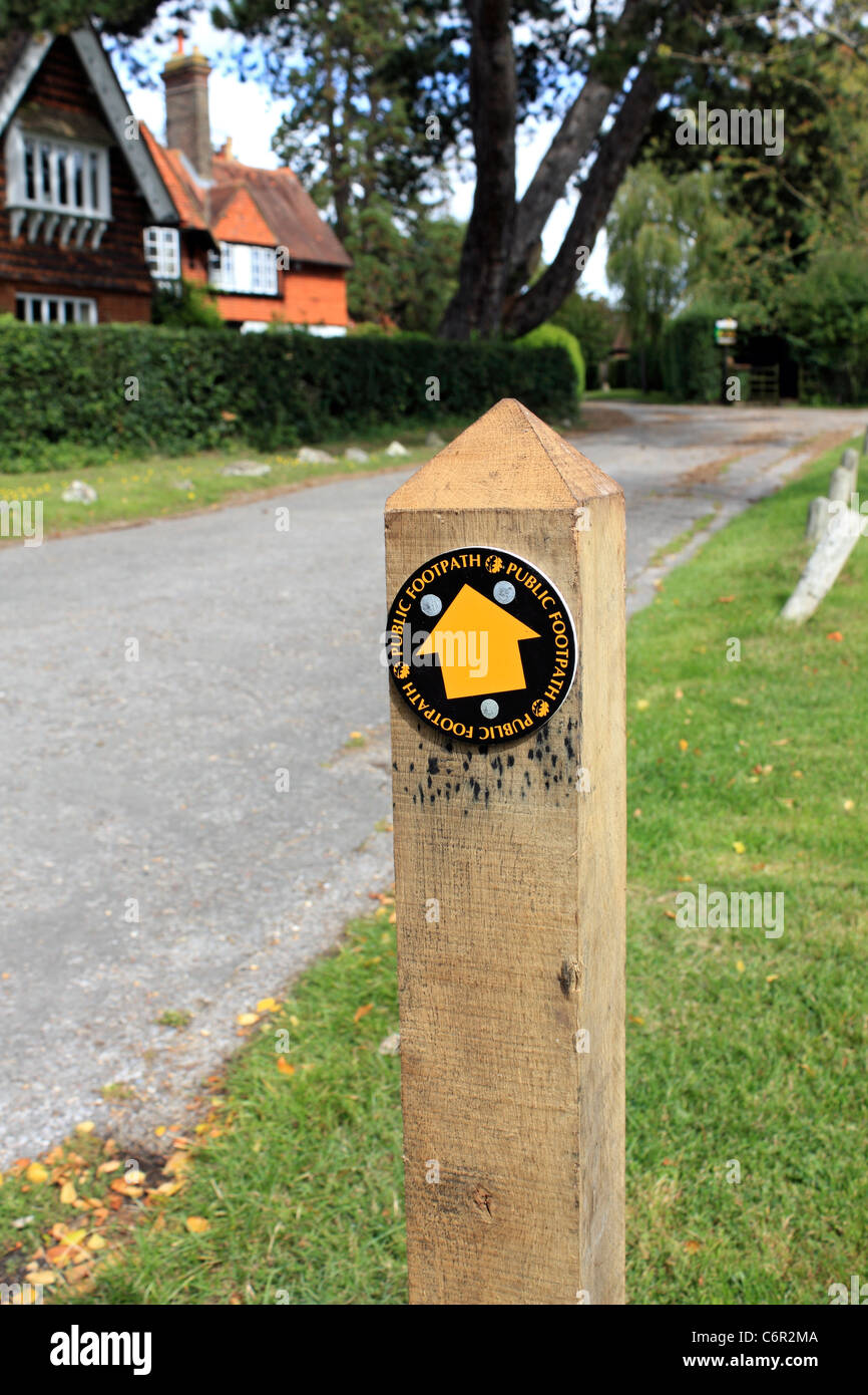 Public footpath sign in the village of Buckland near Reigate, Surrey ...
