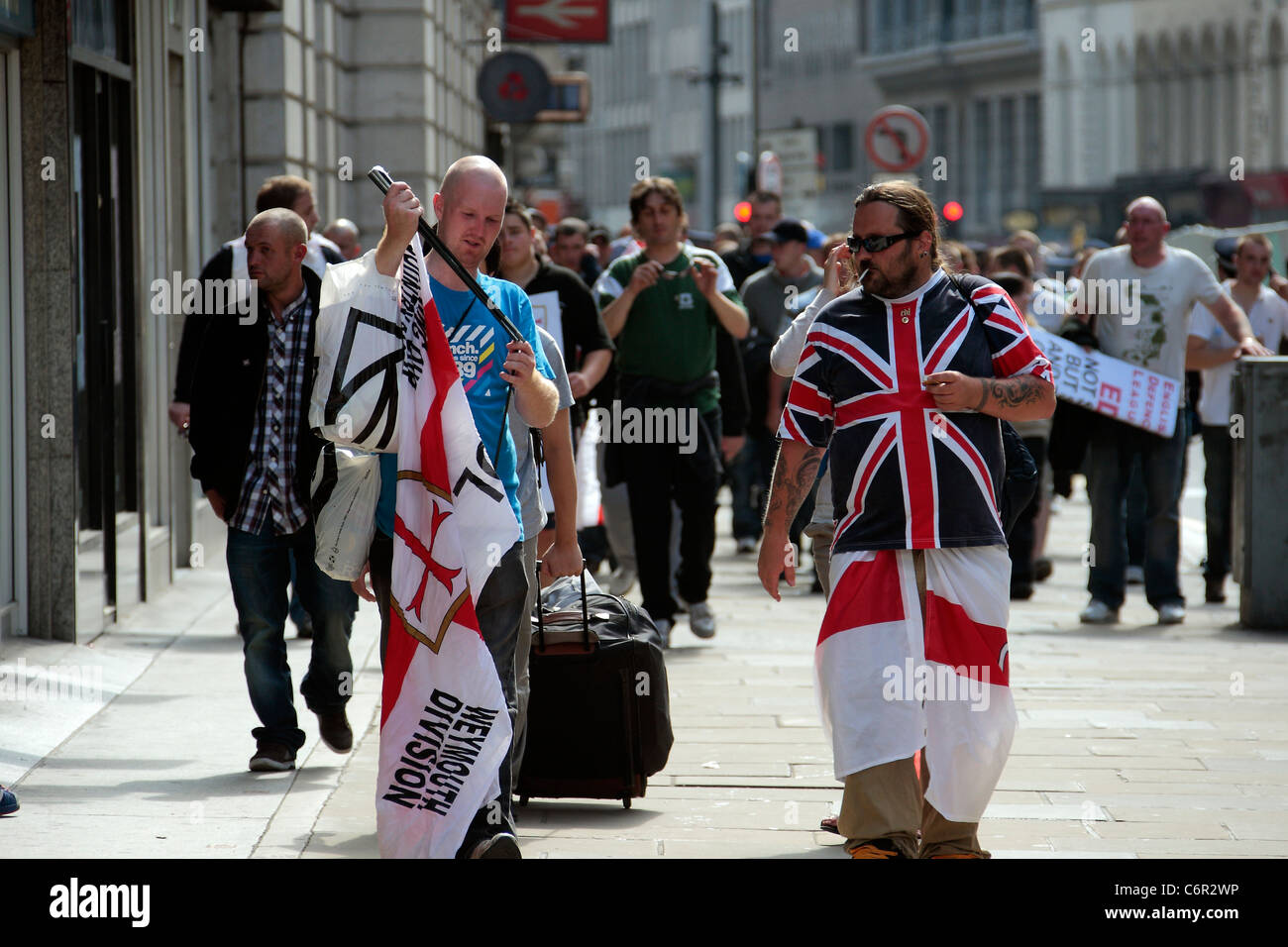 EDL supporters on their way to static demo point in Aldgate London ...