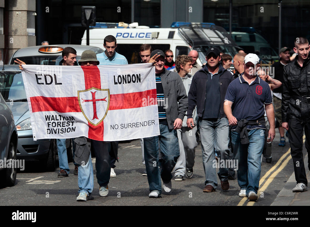 EDL supporters escorted by police to static demonstration point in ...