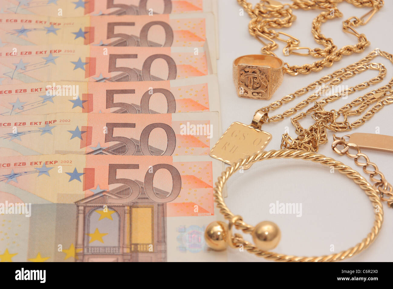 Gold and money Stock Photo - Alamy