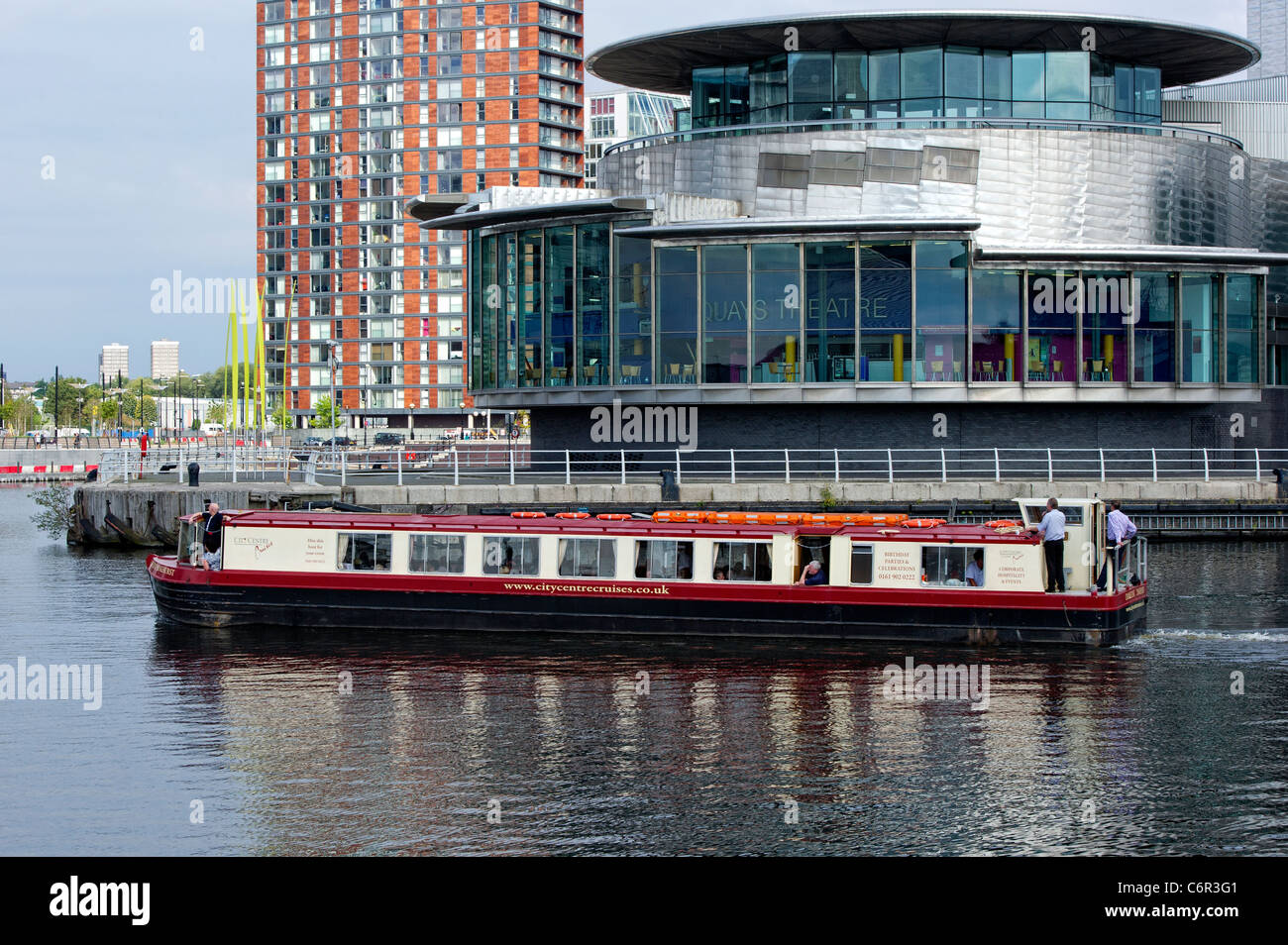 Barge entering one of the docks in Salford Quays from the Manchester ...