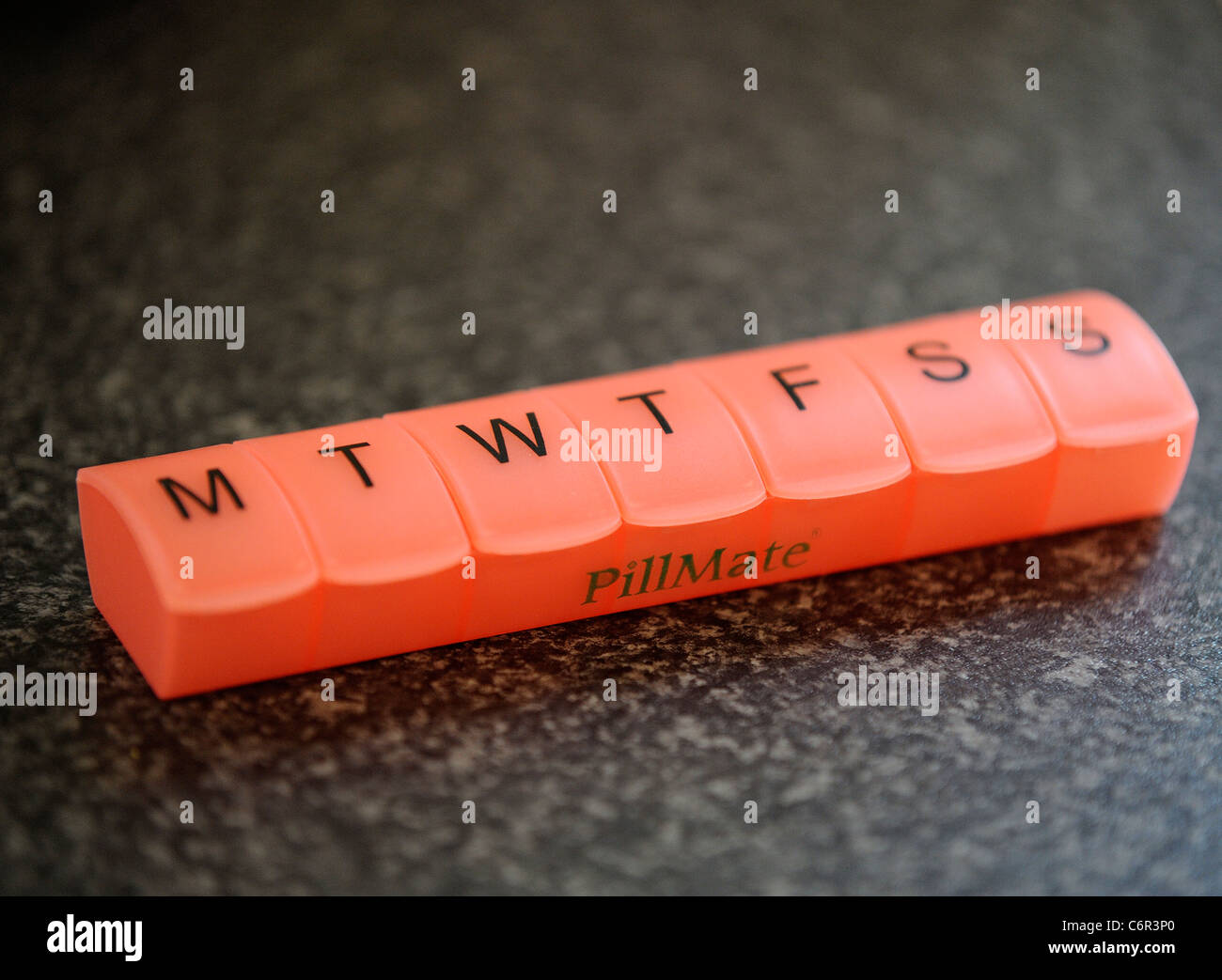 pillmate pill box for days of the week pill taking Stock Photo - Alamy