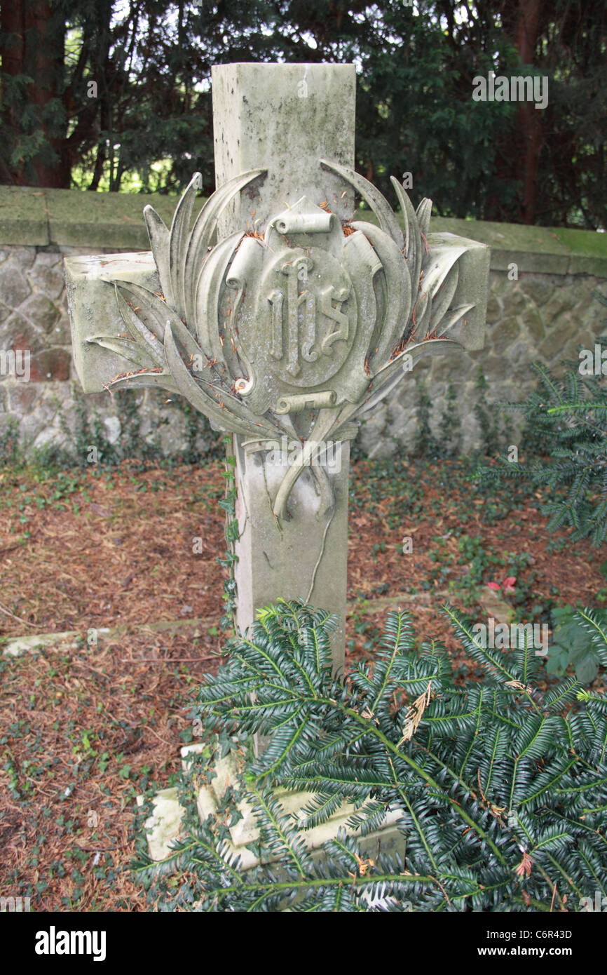 Elaborate stone cross in English graveyard. This cross bears a popular ...