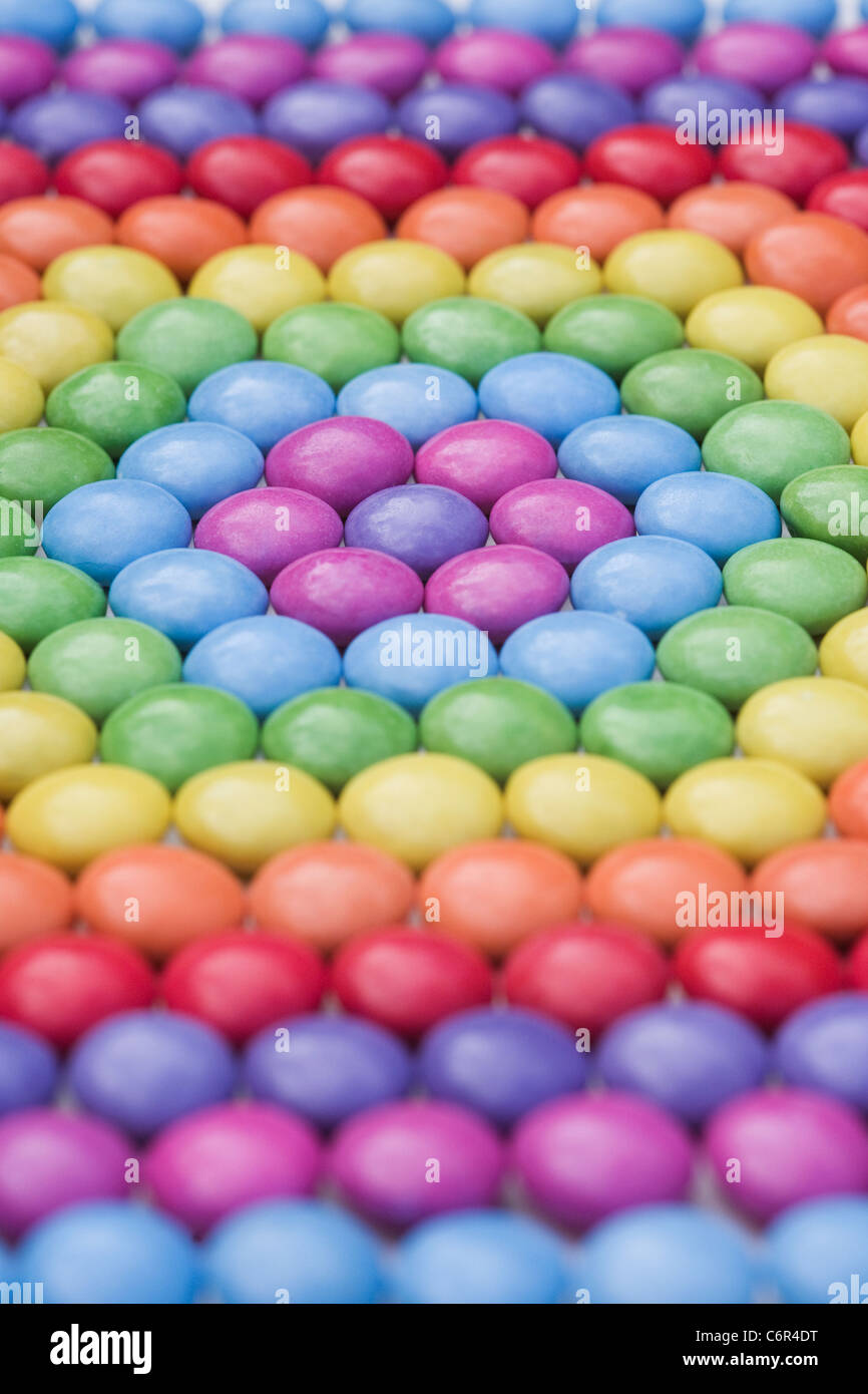 Hexagon shaped smartie pattern. Close up Stock Photo - Alamy