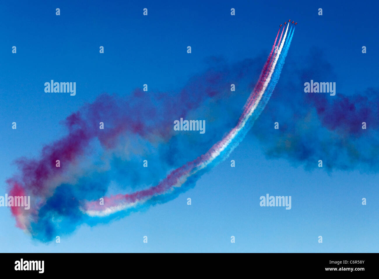 "Red Arrows" aerobatic display team. Red, white and blue [vapour trails ...