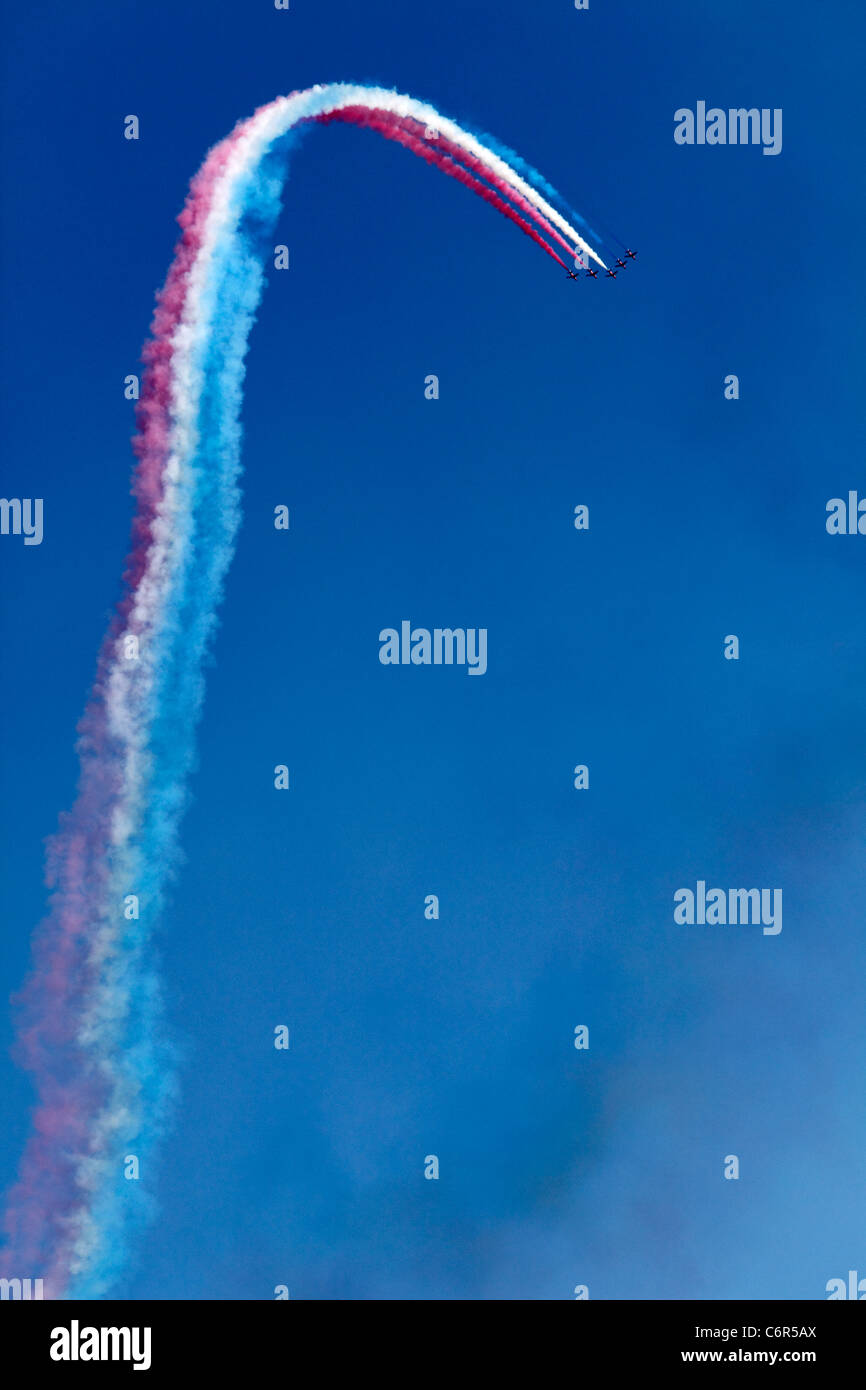 "Red Arrows" aerobatic display team. Red, white and blue [vapour trails ...