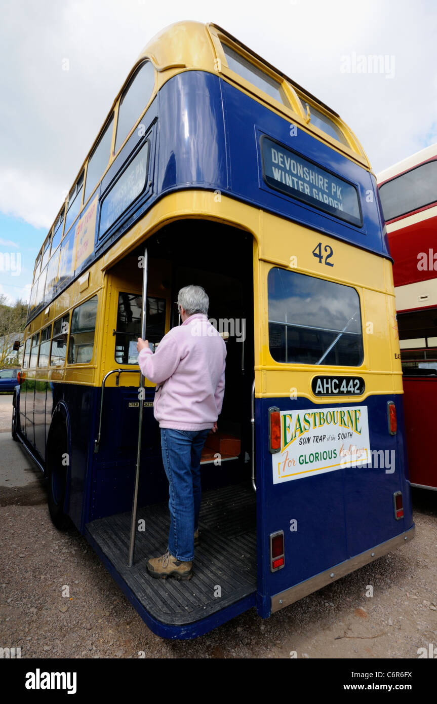 Woman standing on Platform of Classic Devon General Double Decker Bus ...