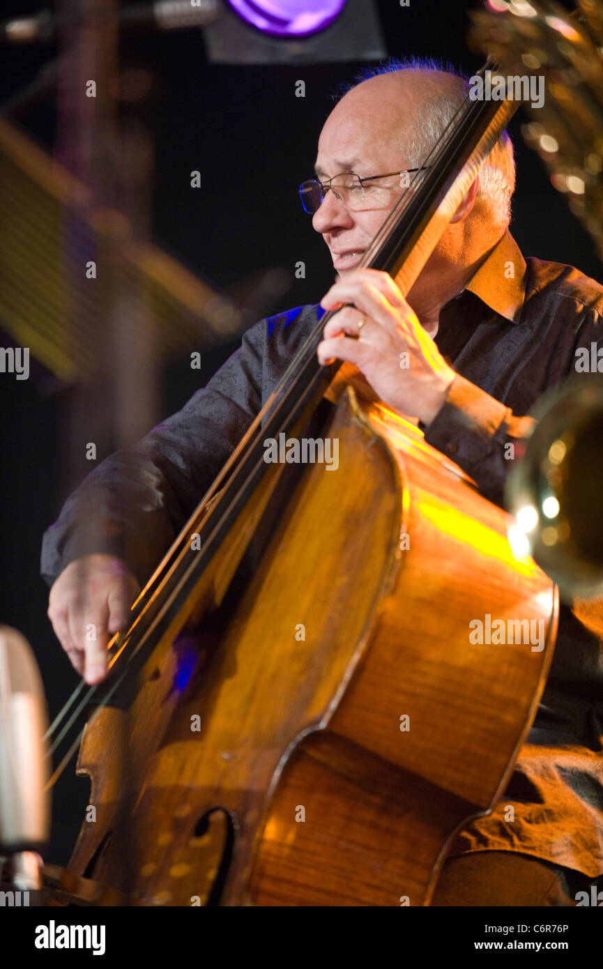 Chris Laurence double bass player performing on stage with John Surman ...