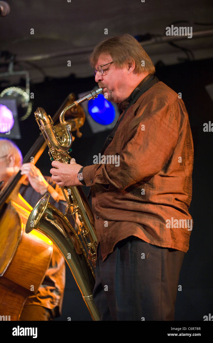 Saxophonist John Surman performing with his band at Brecon Jazz ...