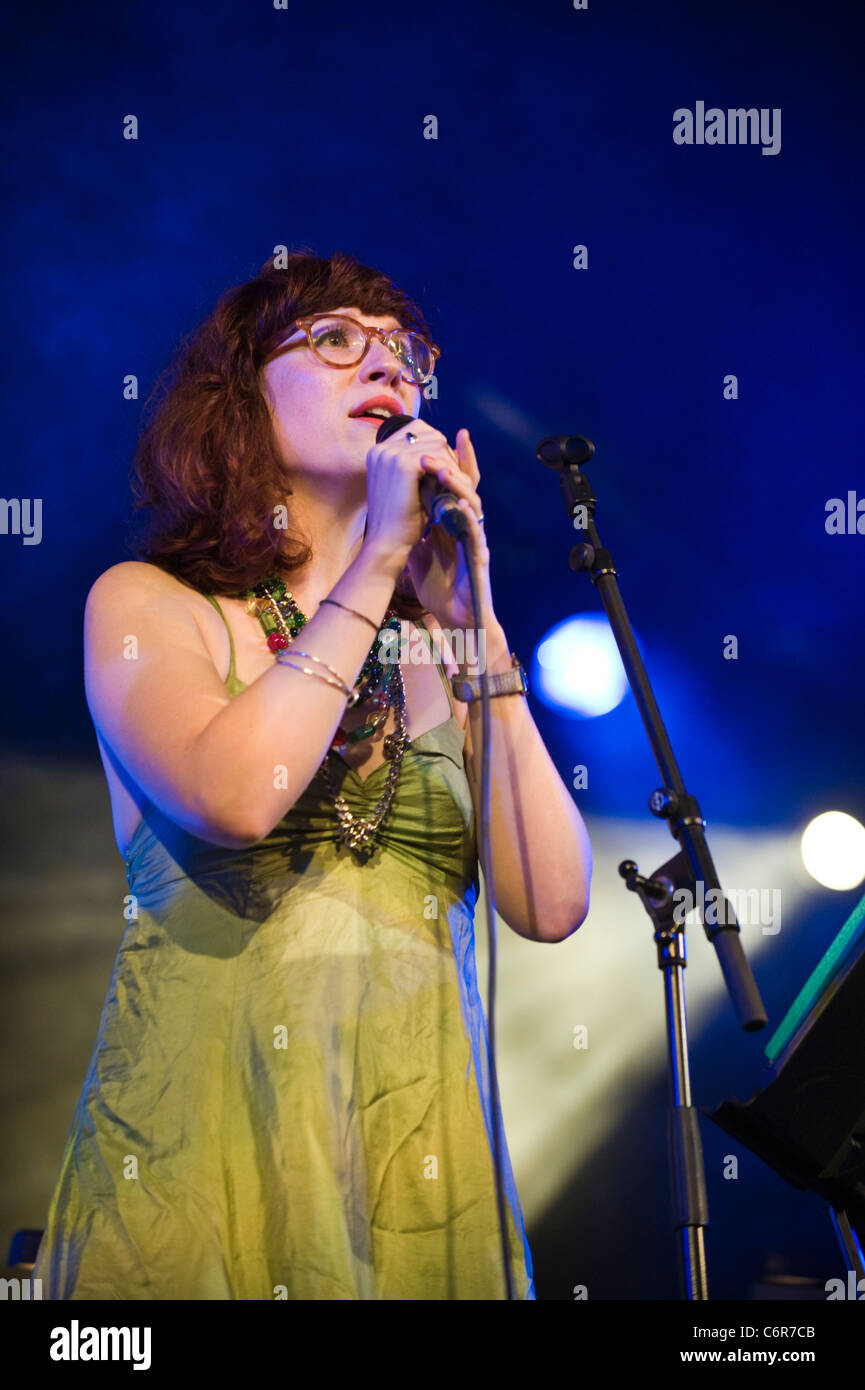 Alice Grant singing with the Matthew Herbert Big Band on stage at ...