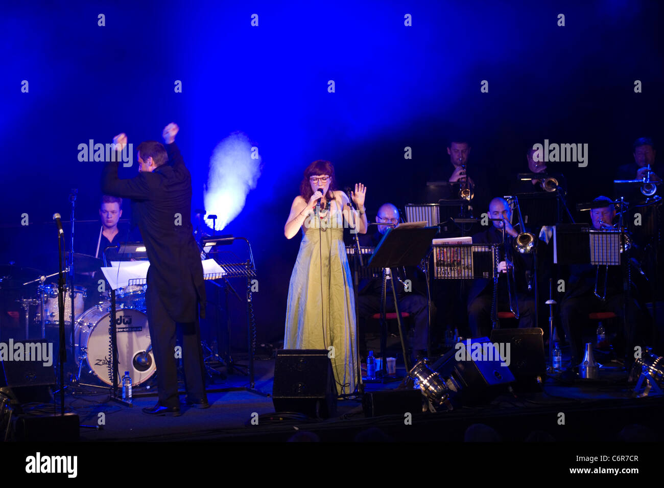 Alice Grant singing with the Matthew Herbert Big Band on stage at ...