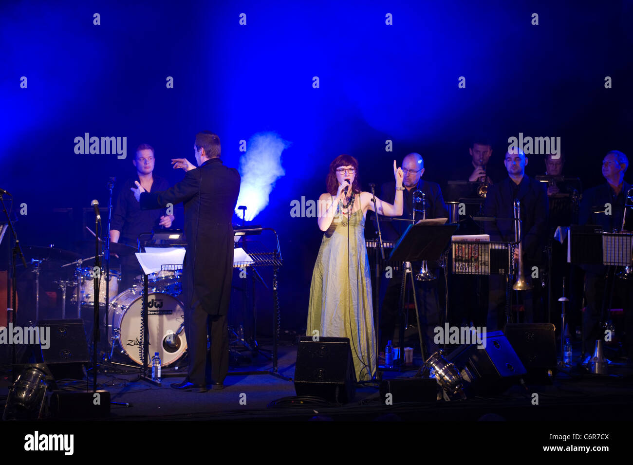 Alice Grant singing with the Matthew Herbert Big Band on stage at ...