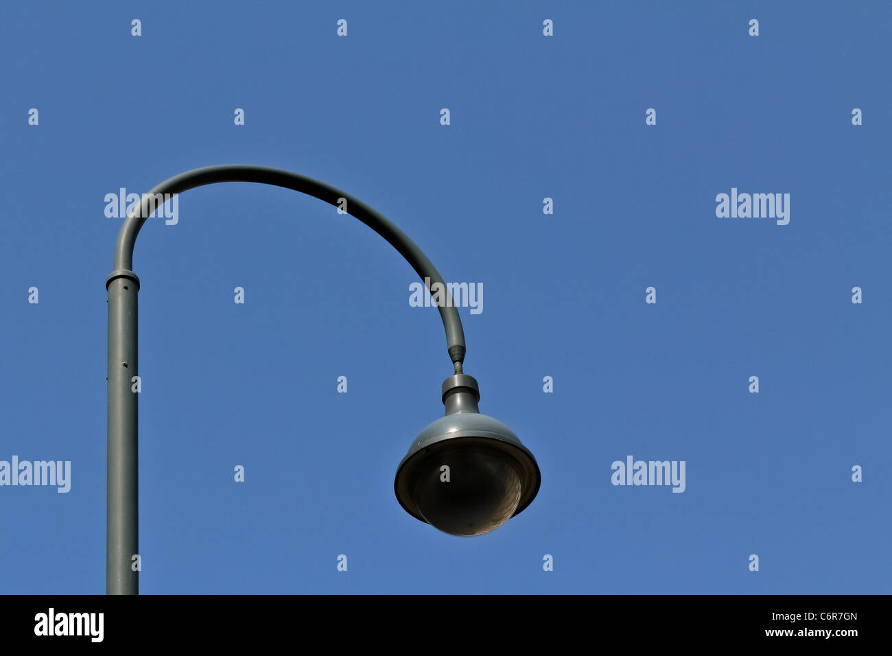 A modern street lamp on a street in Vienna with a round shape Stock ...