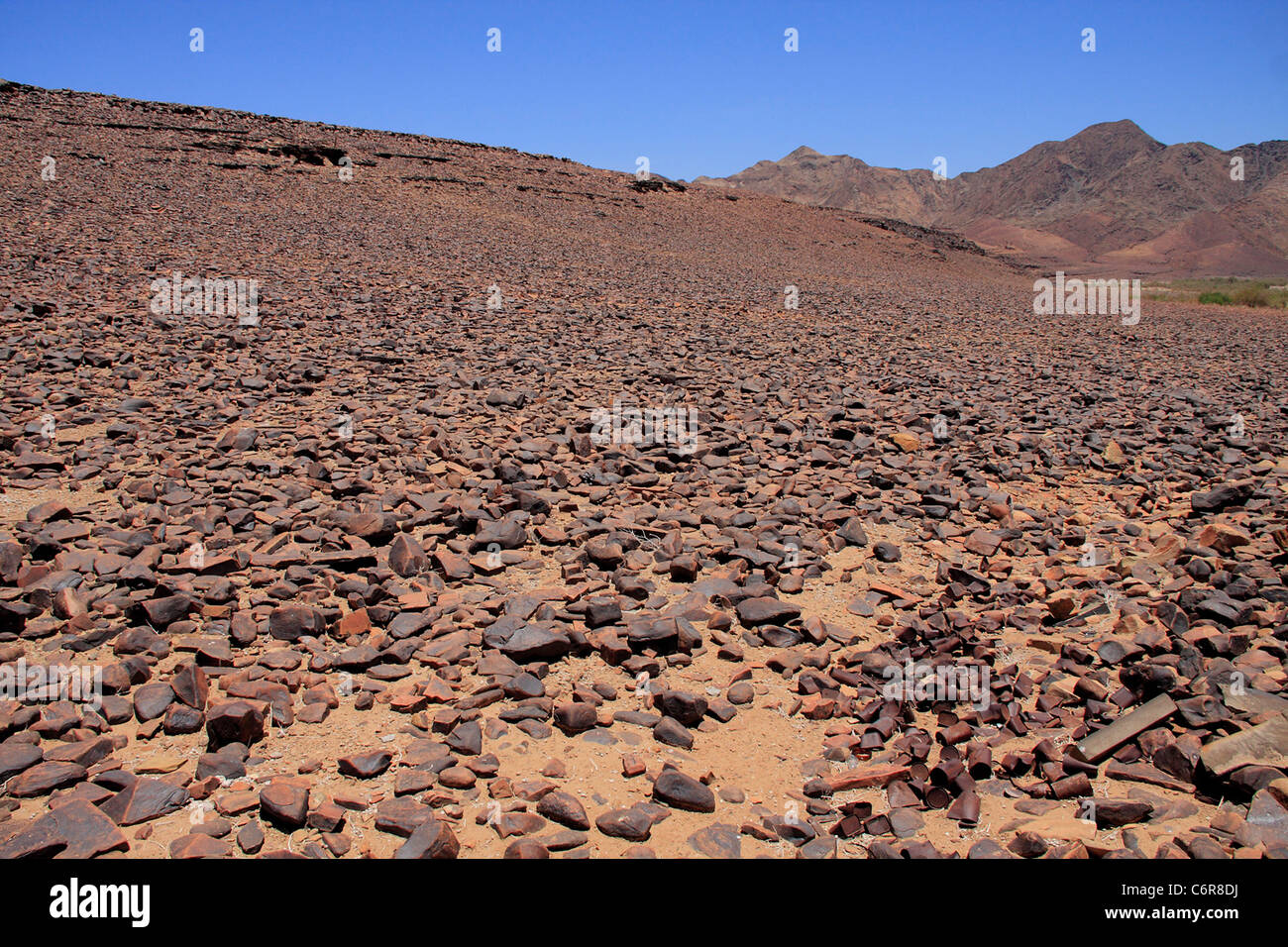 Desert landscape with slate stones Stock Photo - Alamy