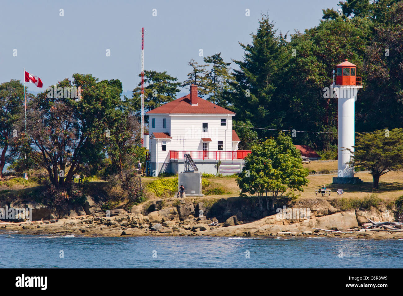 Active Pass Lighthouse on Mayne Island in the Gulf Islands between ...