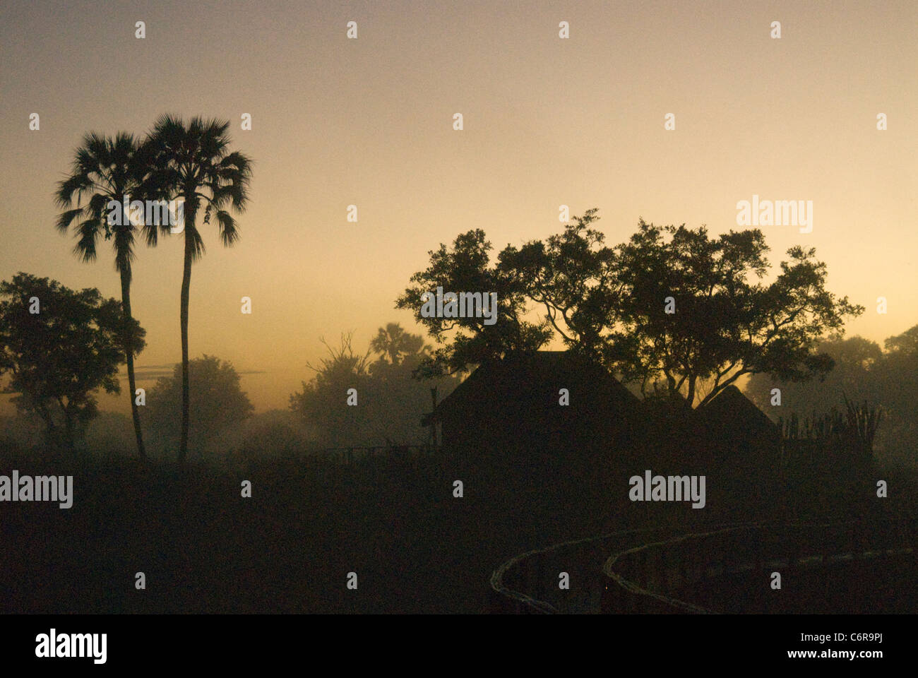 Sunset over bush camp Stock Photo - Alamy