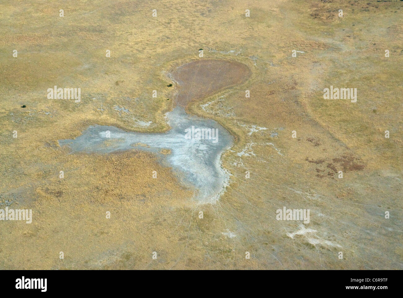 Aerial view over dry pan in arid landscape Stock Photo - Alamy