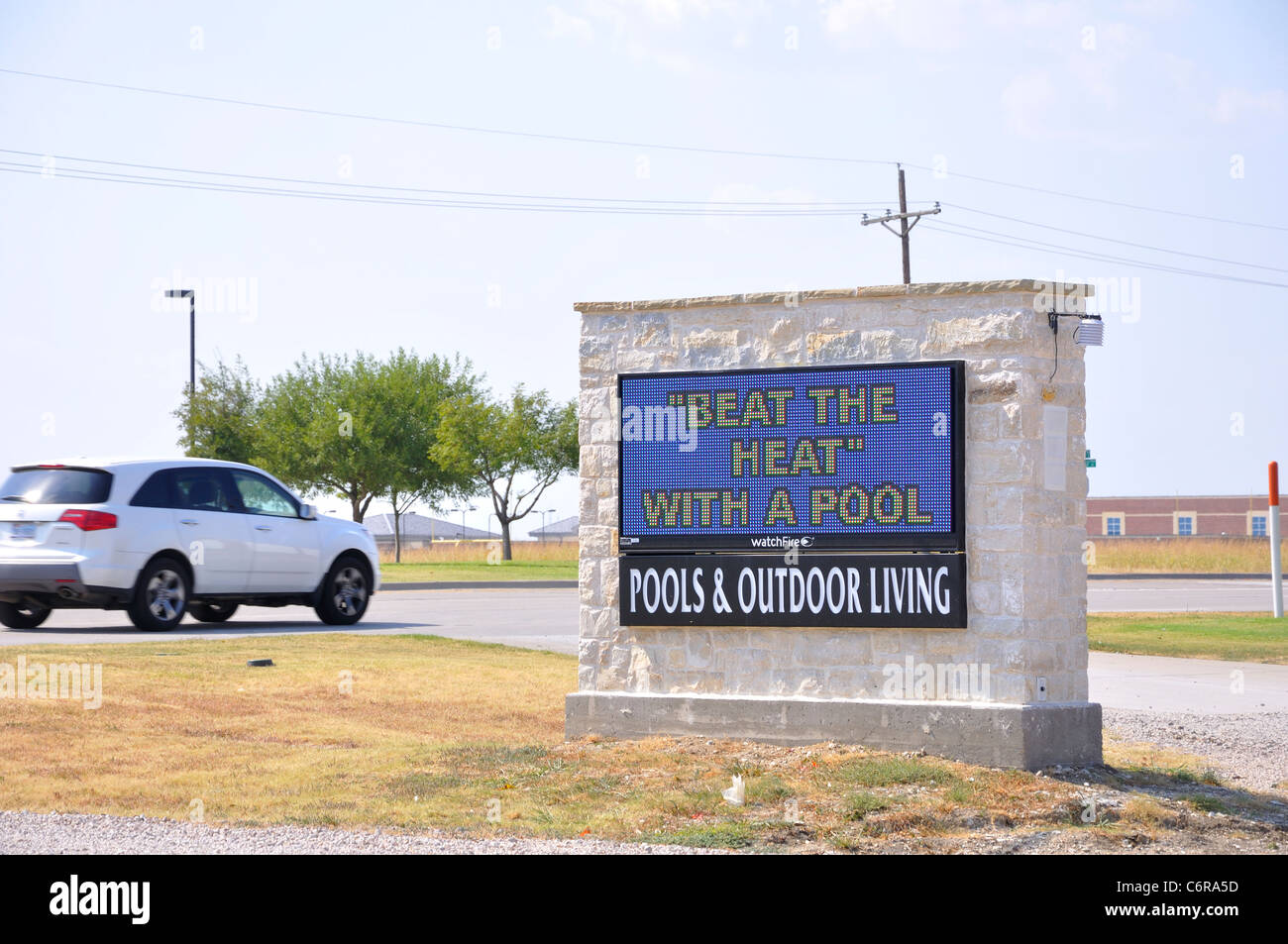 Electronic roadside sign with advertisement Stock Photo - Alamy