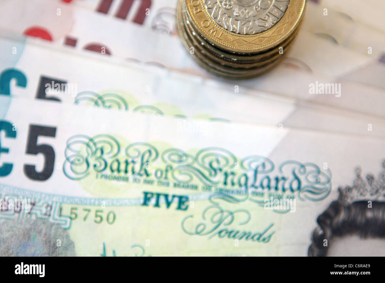 Money stack above notes hi-res stock photography and images - Alamy