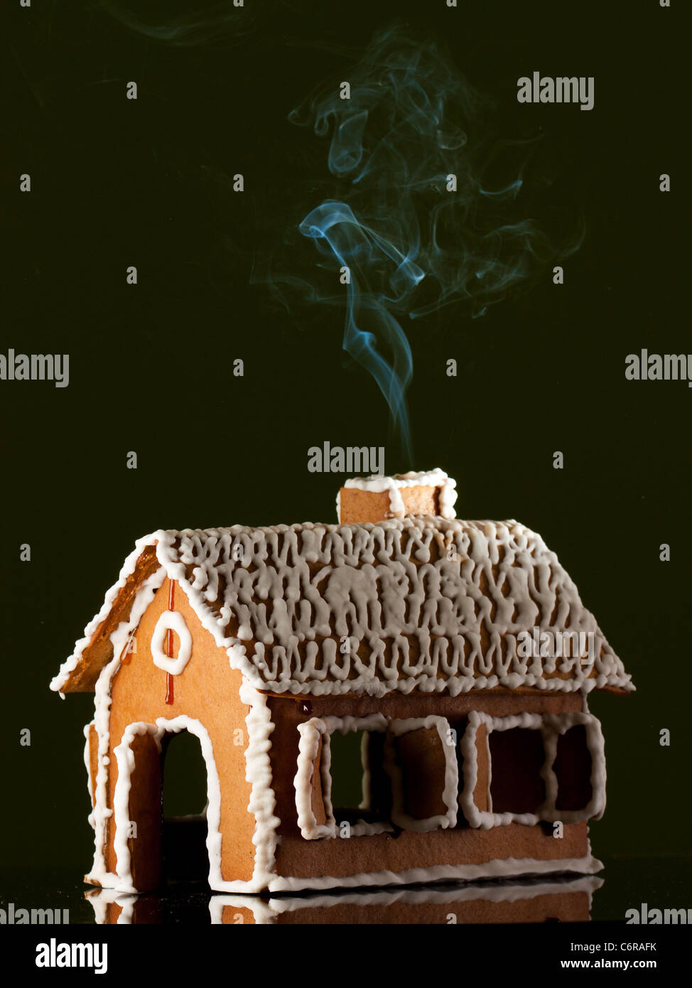 Gingerbread house on black isolated Stock Photo - Alamy