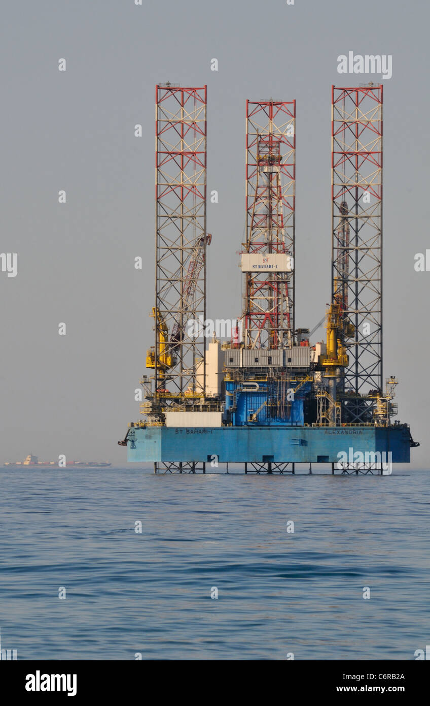 A jackup oil rig lies in the shallow waters of the Red Sea off the ...