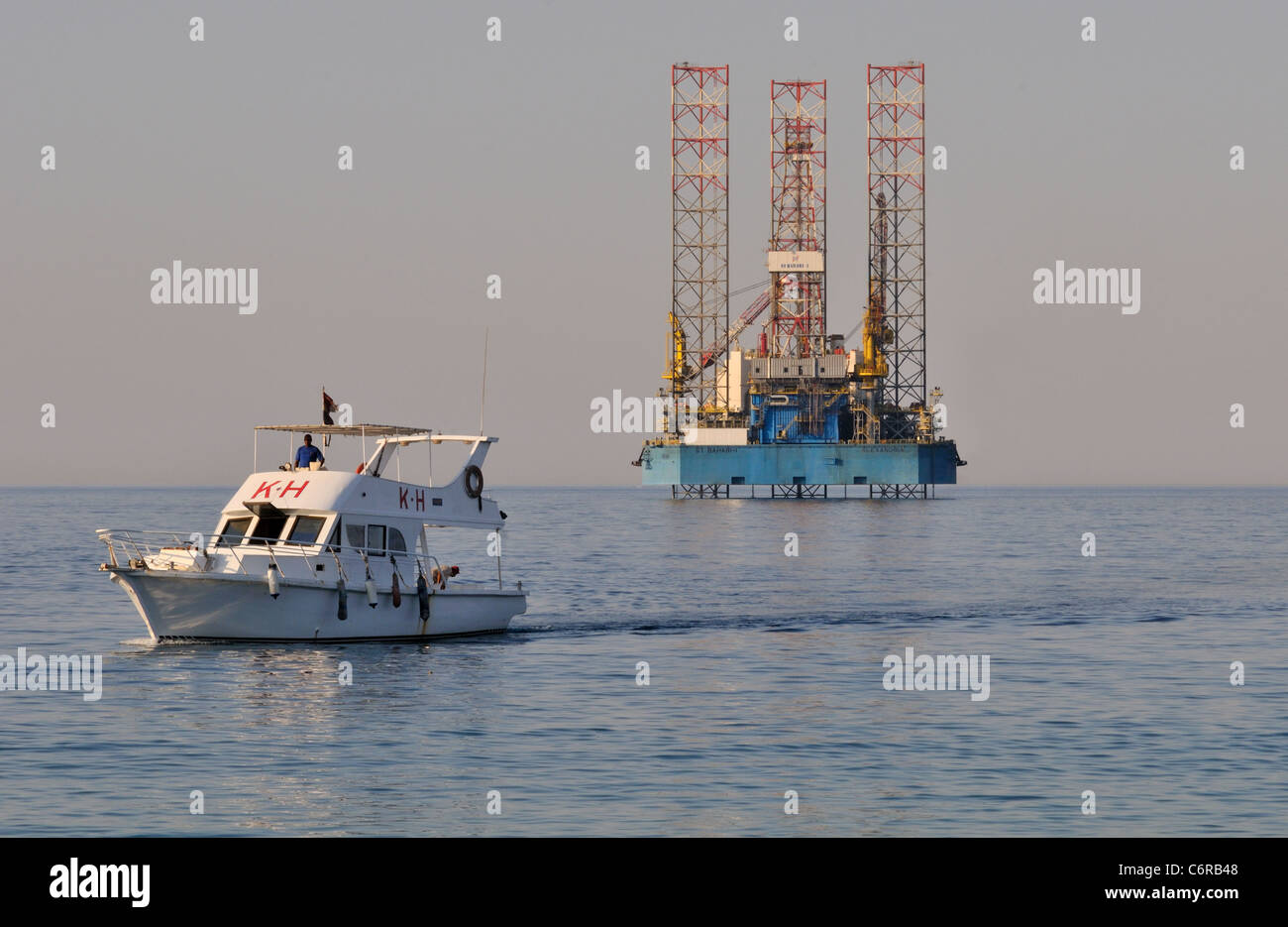 A jackup oil rig lies in the shallow waters of the Red Sea off the ...