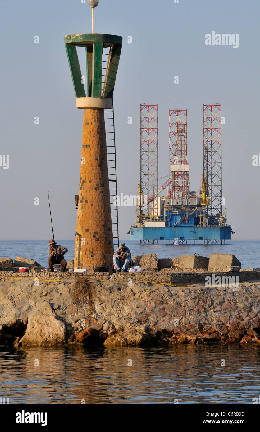 A jackup oil rig lies in the shallow waters of the Red Sea off the ...